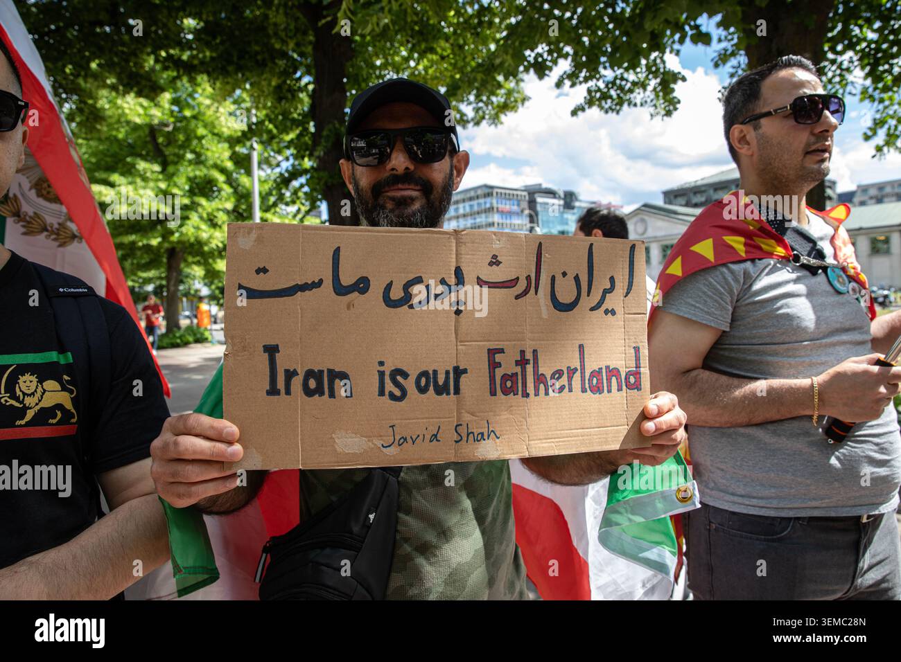 Berlin, Germany. 06th June, 2026. A demonstrator holds a handwritten ...