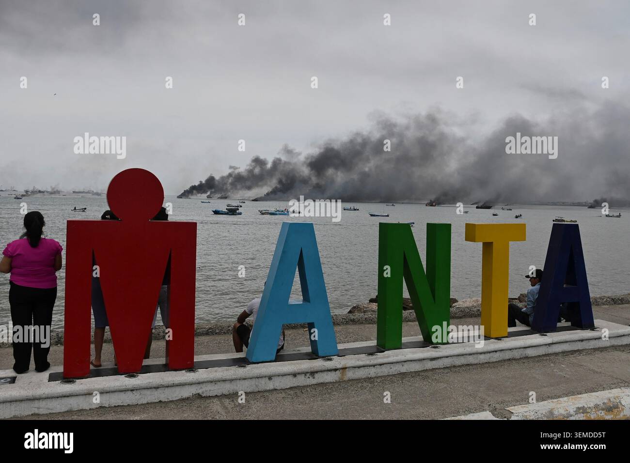 Fishing boats burn in Manta, Ecuador, Saturday, June 6, 2026. (AP Photo ...