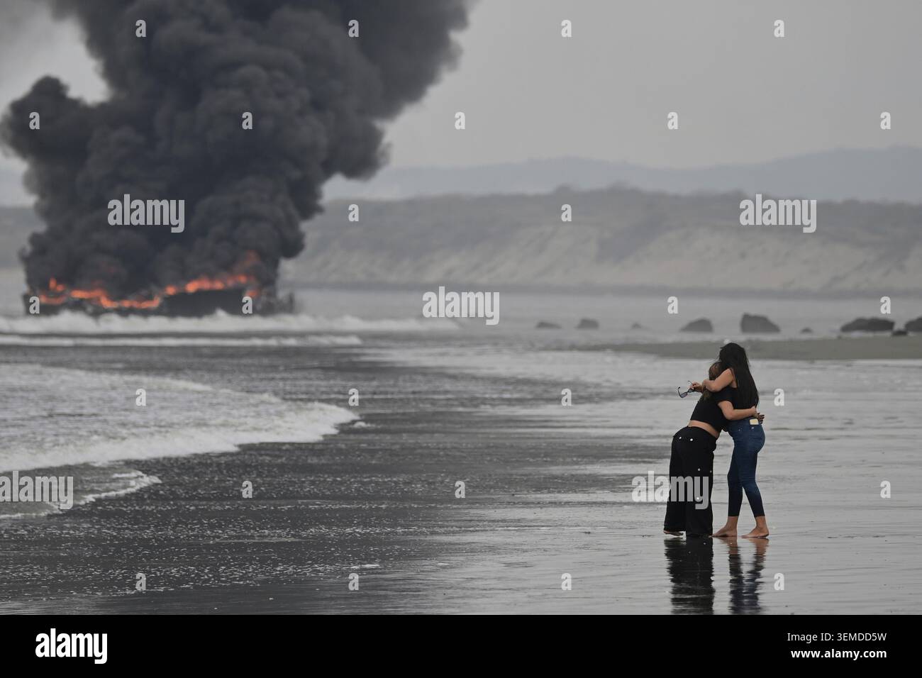 Fishing boats burn in Manta, Ecuador, Saturday, June 6, 2026. (AP Photo ...