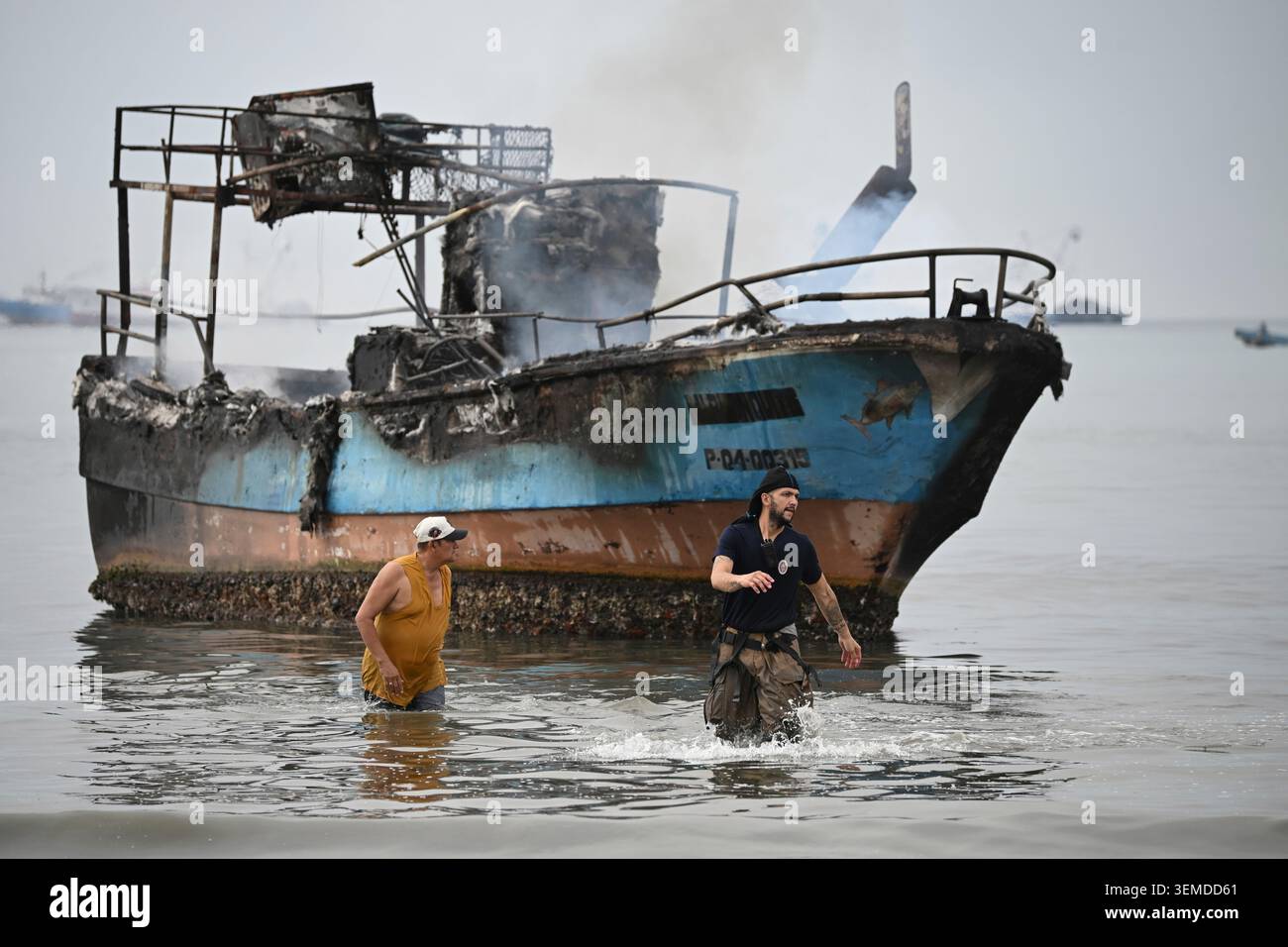Fishing boats burn in Manta, Ecuador, Saturday, June 6, 2026. (AP Photo ...