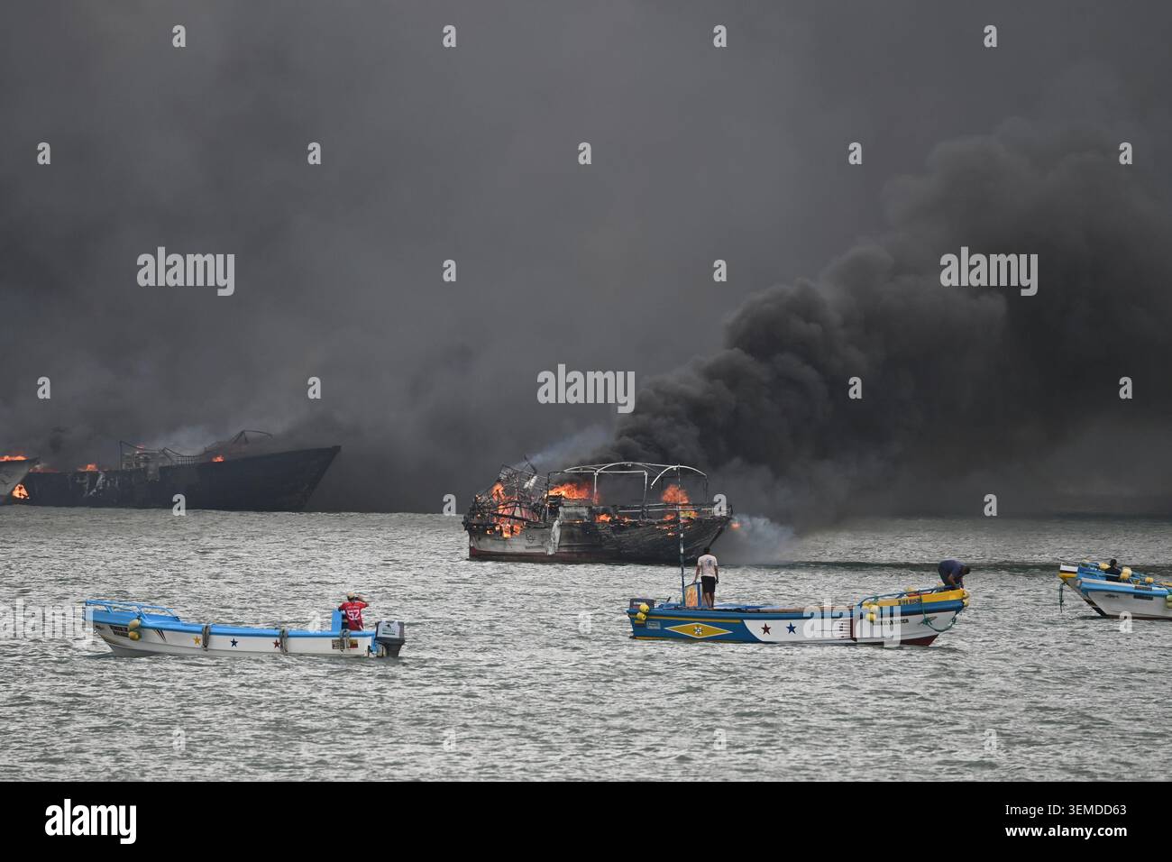 Fishing boats burn in Manta, Ecuador, Saturday, June 6, 2026. (AP Photo ...