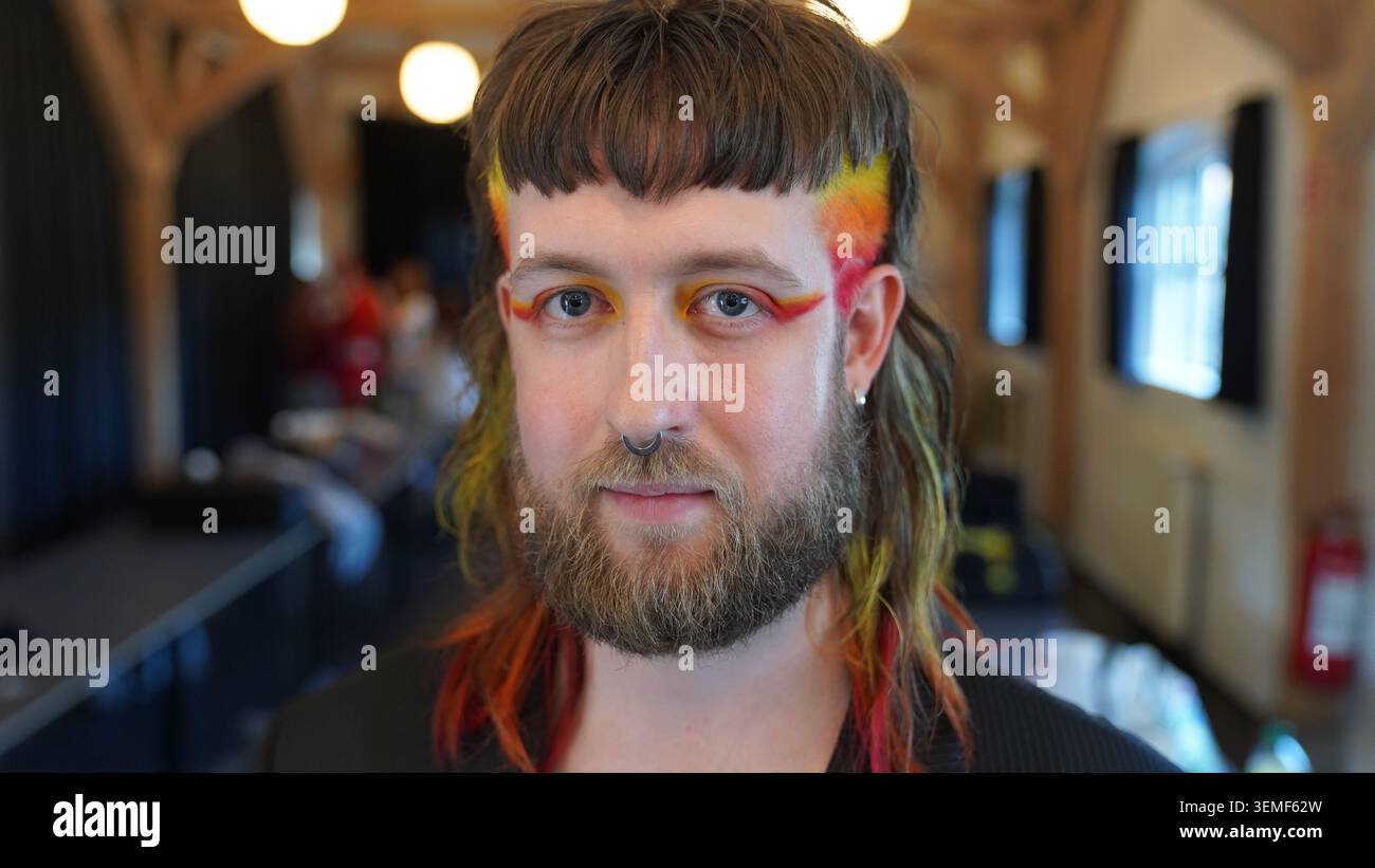 A competitor looks on during Denmark's Mullet Championship, in ...