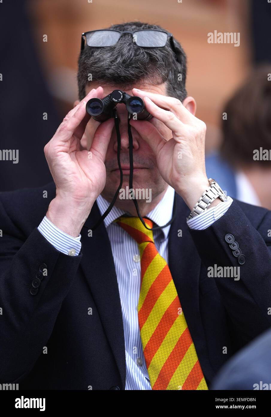 A spectator with binoculars ahead of day four of the first Rothesay ...