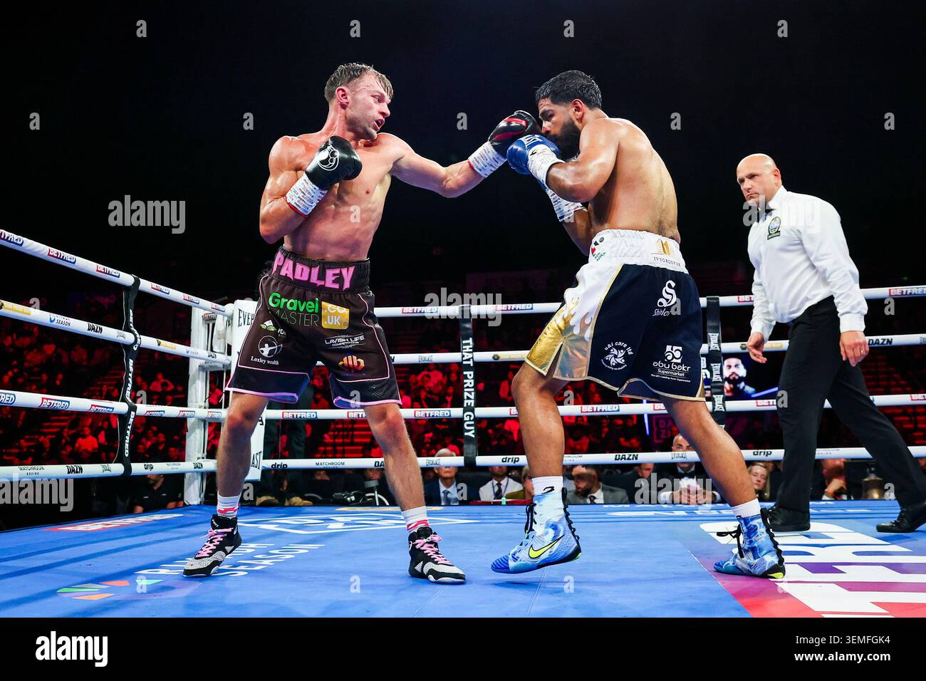 Josh Padley (black & pink shorts) in action against Aqib Fiaz during ...