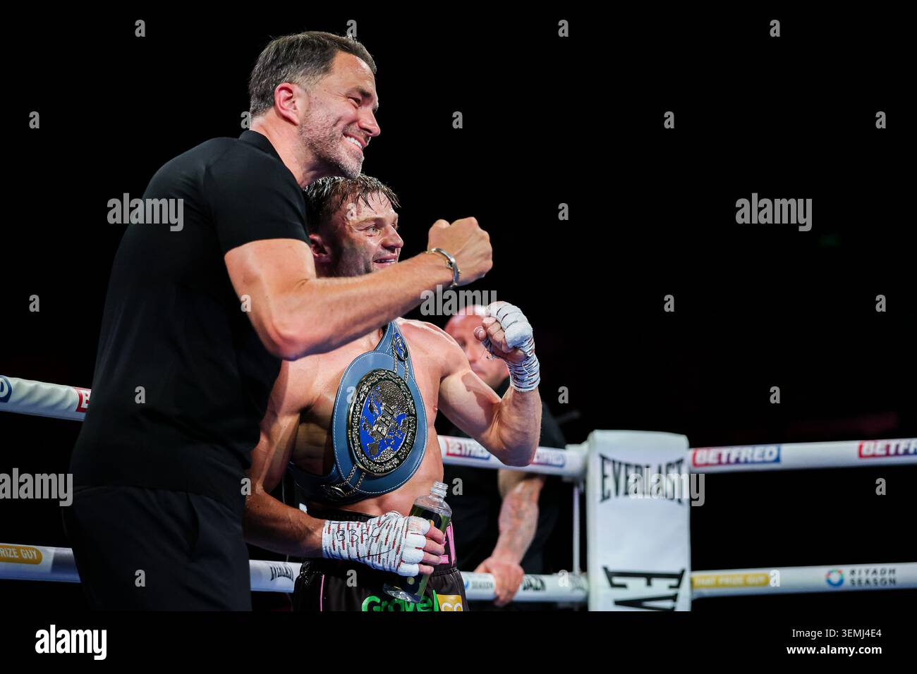 Eddie Hearn celebrates with Josh Padley after his victory vs Aqib Fiaz ...