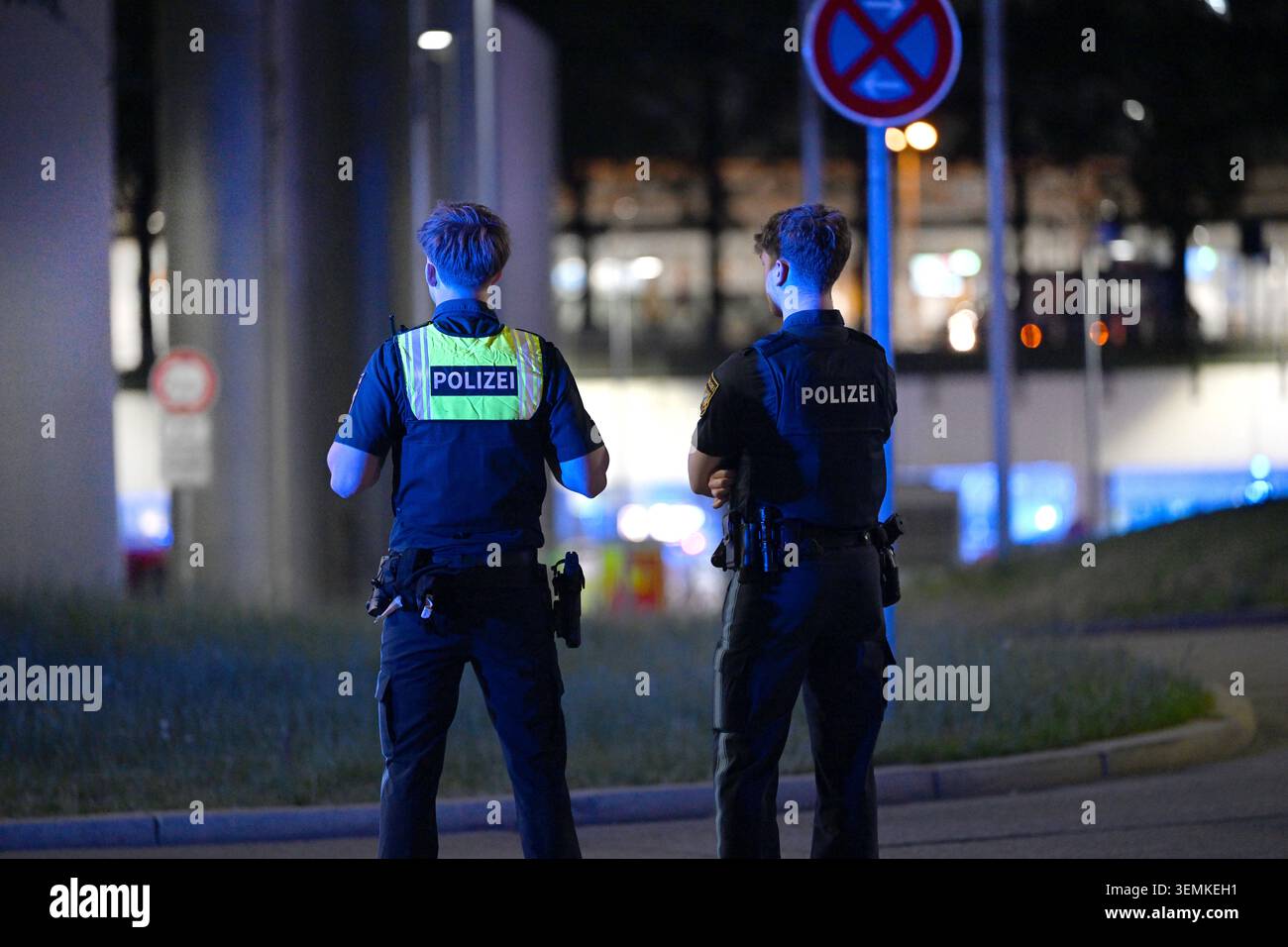 07 June 2026, Bavaria, Munich: Police officers stand at Munich Airport ...