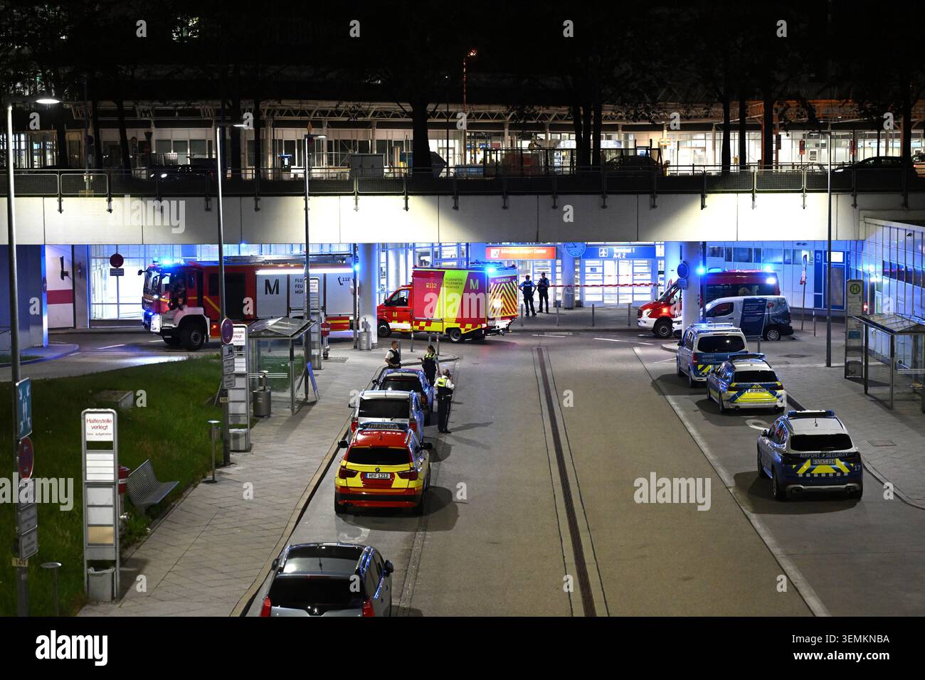 07 June 2026, Bavaria, Munich: Police and fire department vehicles are ...