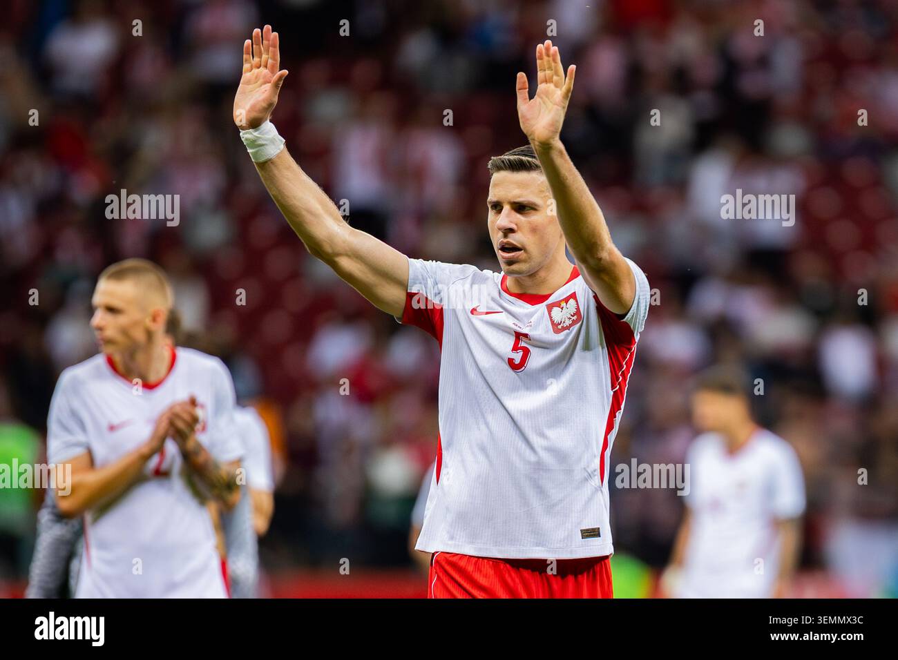 Jan Bednarek of Poland waves during the friendly match between Poland ...