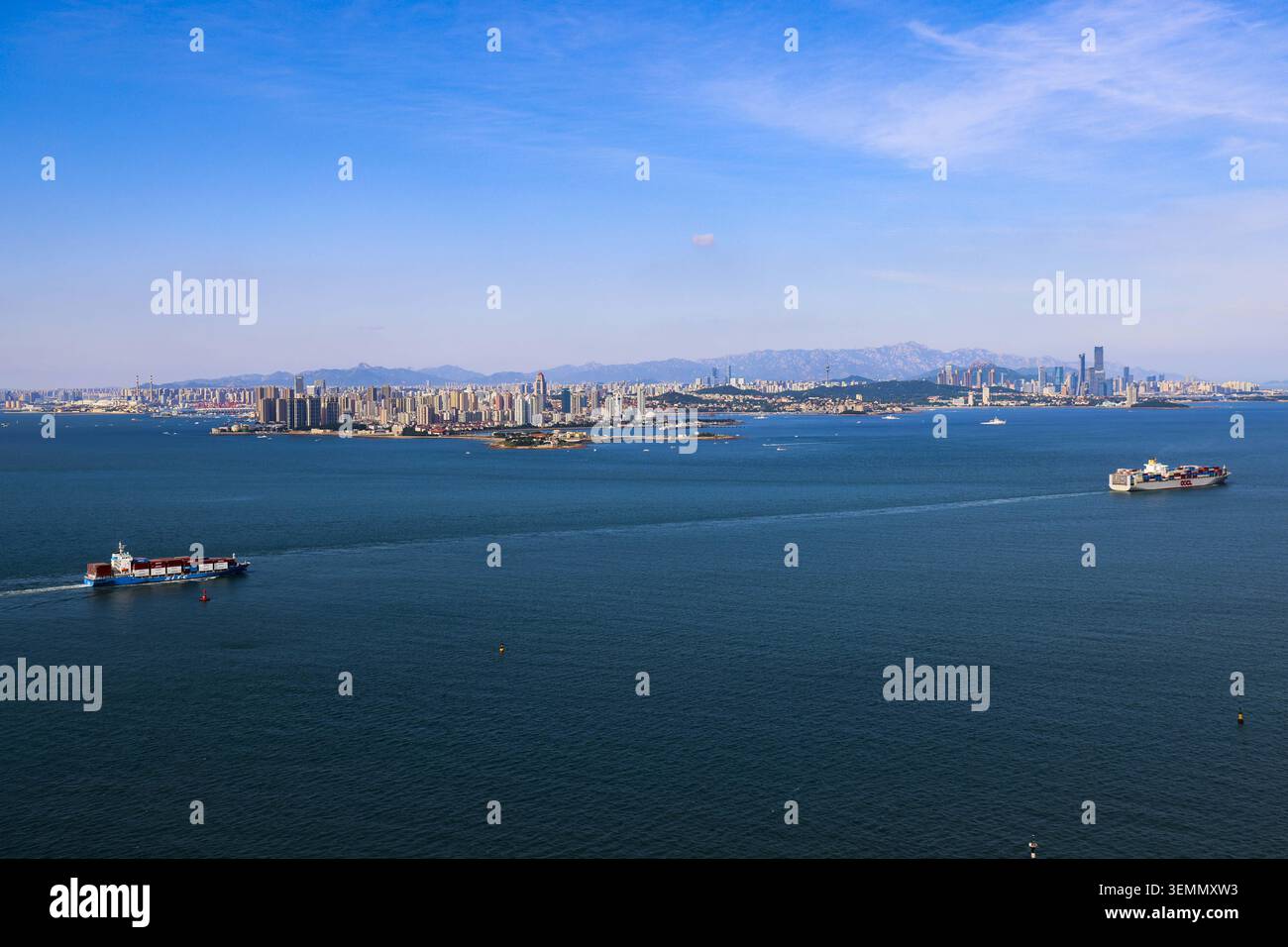 A container ship loaded with containers departs from the Qianwan ...