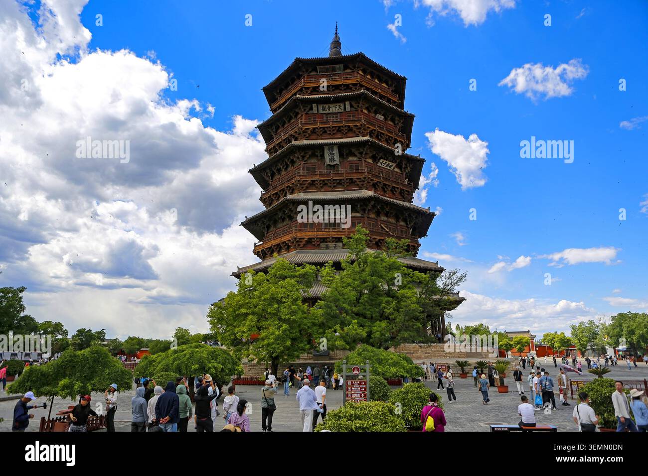Tourists visit the Yingxian Wooden Pagoda, a 67.31-meter-tall pure ...