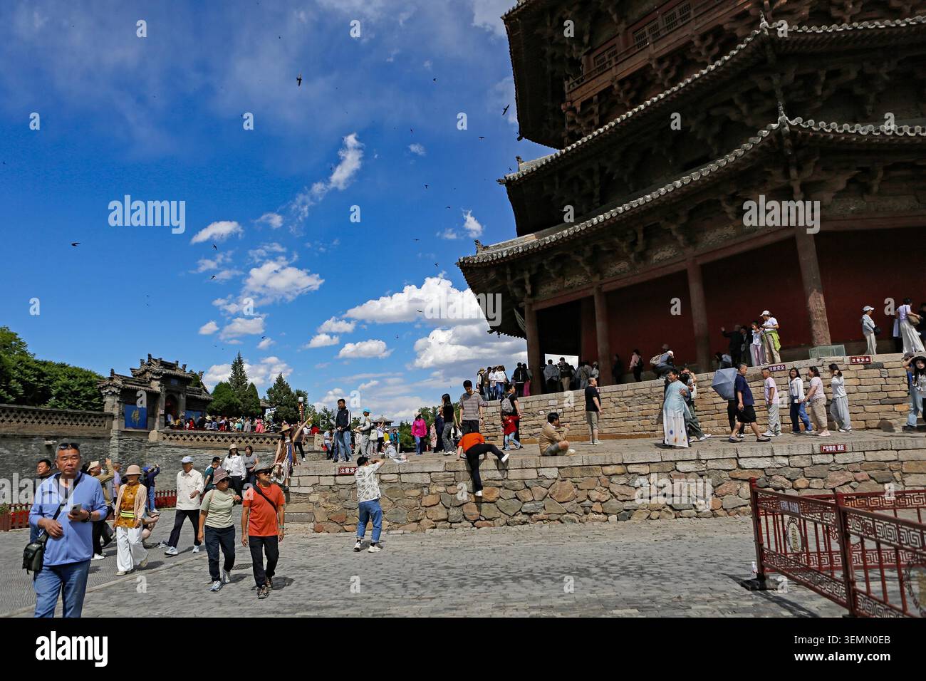 Tourists visit the Yingxian Wooden Pagoda, a 67.31-meter-tall pure ...