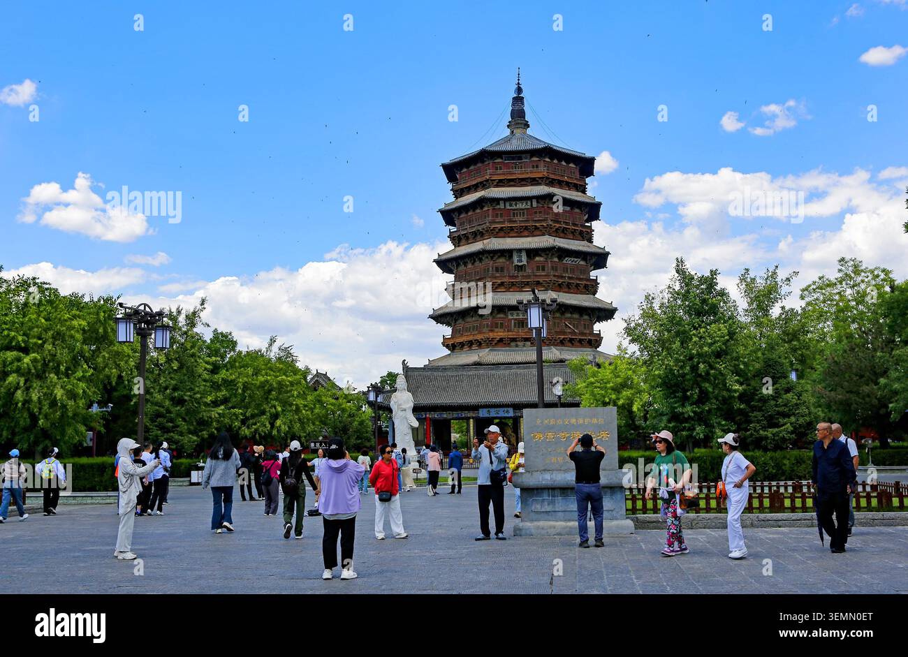 Tourists visit the Yingxian Wooden Pagoda, a 67.31-meter-tall pure ...