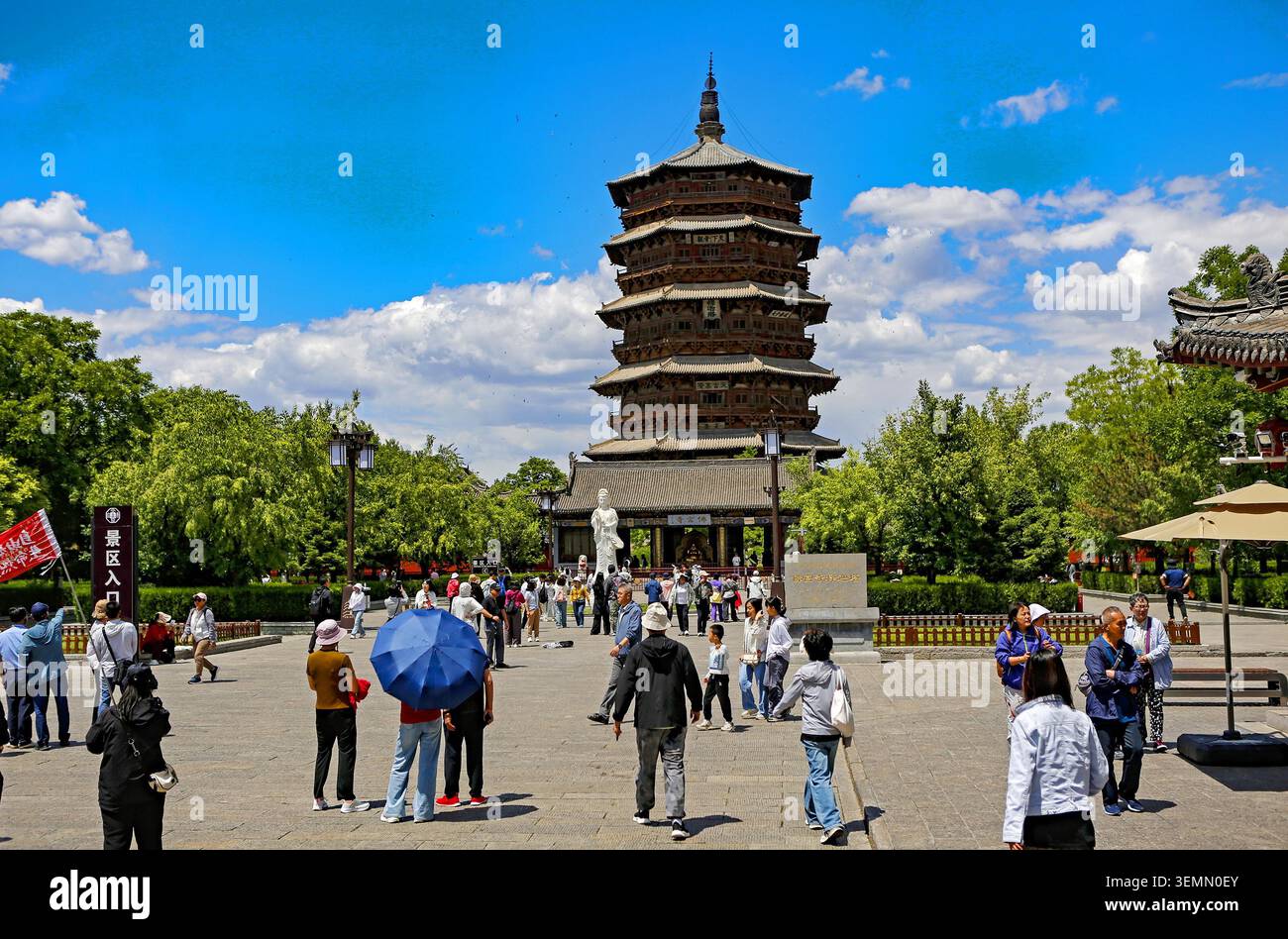 Tourists visit the Yingxian Wooden Pagoda, a 67.31-meter-tall pure ...