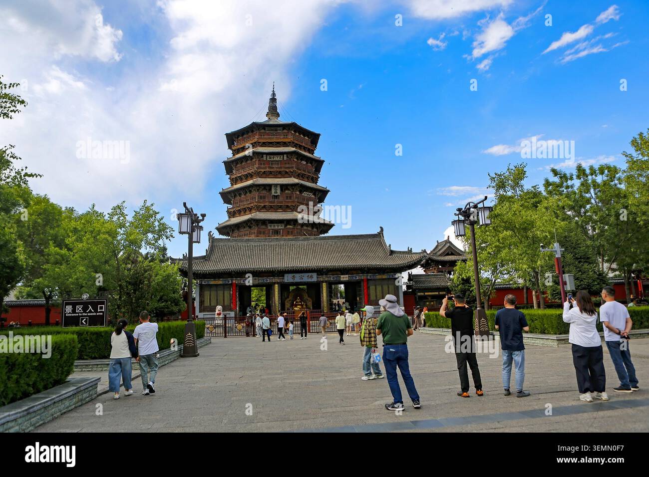 Tourists visit the Yingxian Wooden Pagoda, a 67.31-meter-tall pure ...