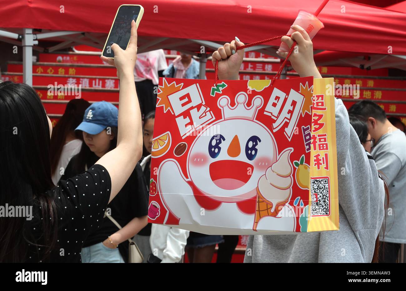Customers visit Mixue Ice Cream & Tea's flagship store in Kunming ...