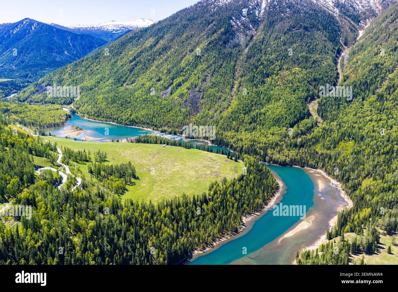 The Kanas River meanders through the valley at Kanas Moon Bay ...