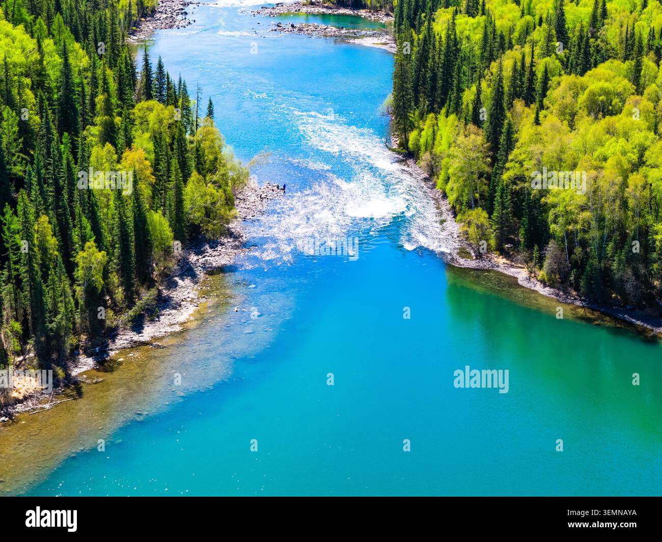 The Kanas River meanders through the valley at Kanas Moon Bay ...