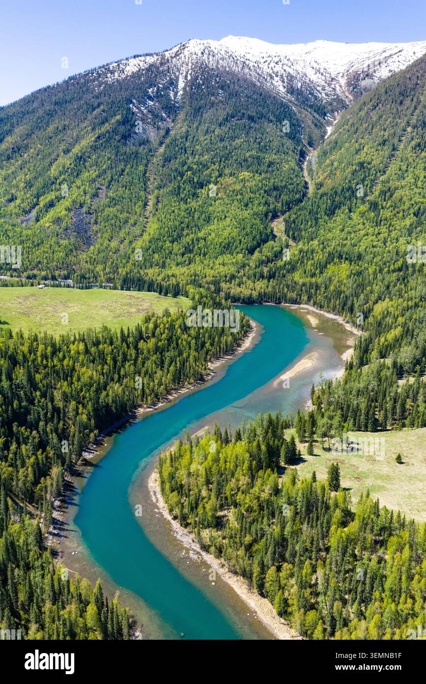 The Kanas River meanders through the valley at Kanas Moon Bay ...