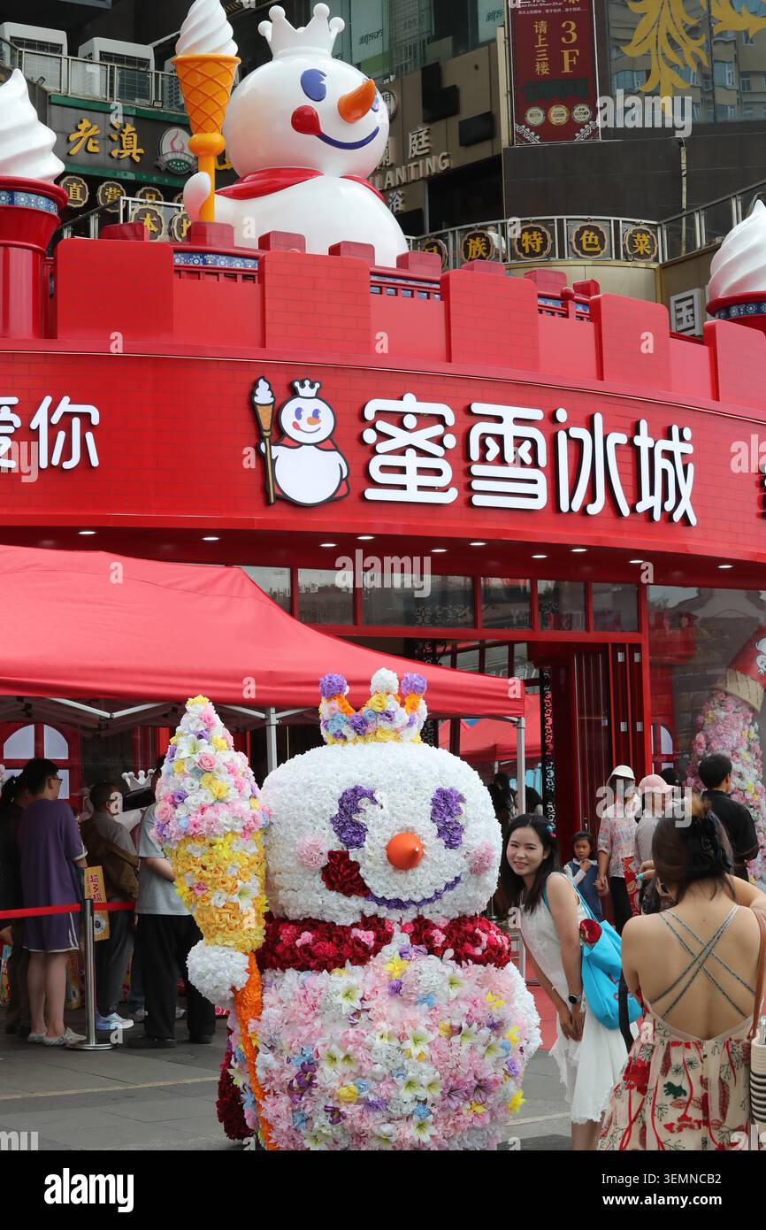 Customers visit Mixue Ice Cream & Tea's flagship store in Kunming ...