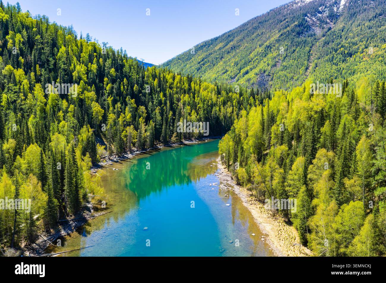 The Kanas River meanders through the valley at Kanas Moon Bay ...