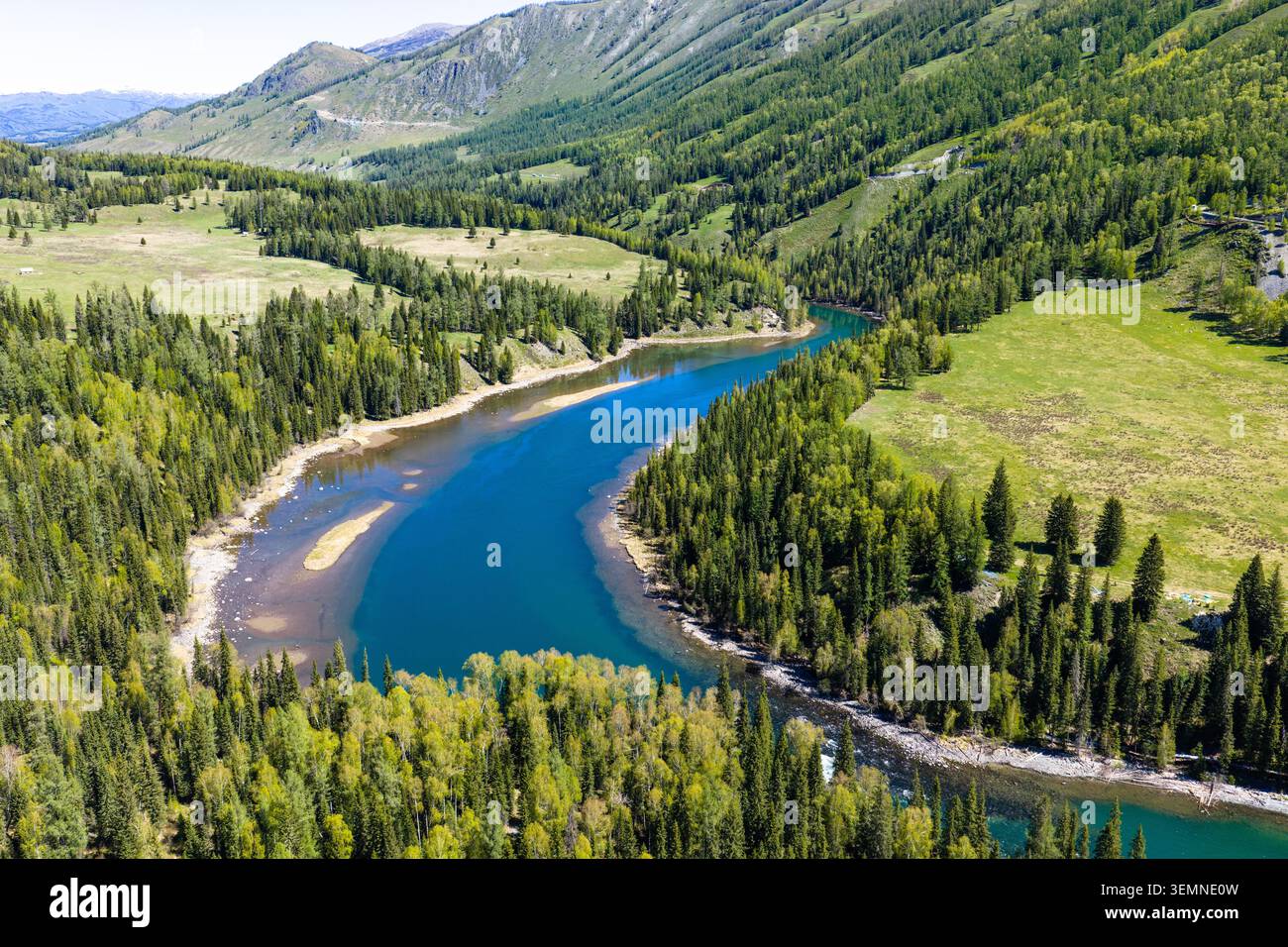 The Kanas River meanders through the valley at Kanas Moon Bay ...