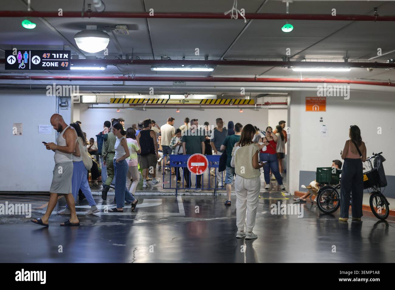 08 June 2026, Israel, Tel Aviv: Tel Aviv residents take cover inside an ...