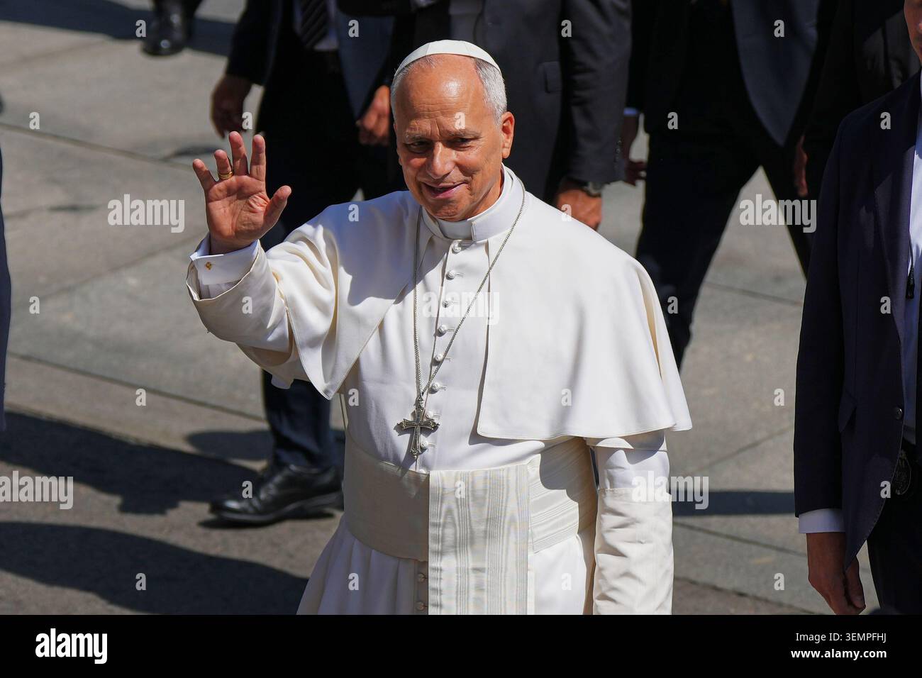 Pope Leo XIV waves as he exits the Spanish parliament in Madrid, Spain ...