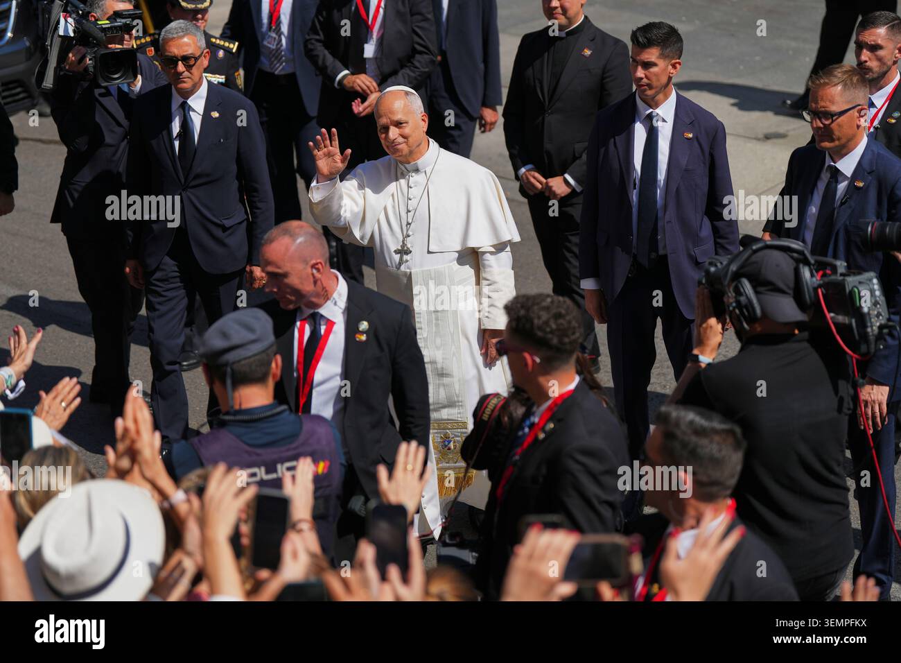 Pope Leo XIV waves as he exits the Spanish parliament in Madrid, Spain ...