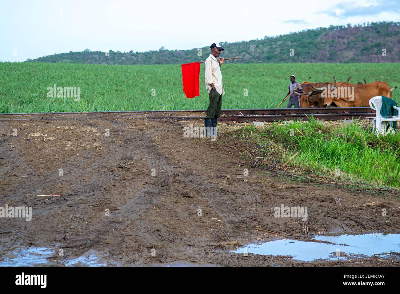 Dominican Republic, La Romana - 08 Jun 2021: Two men in hats and boots ...