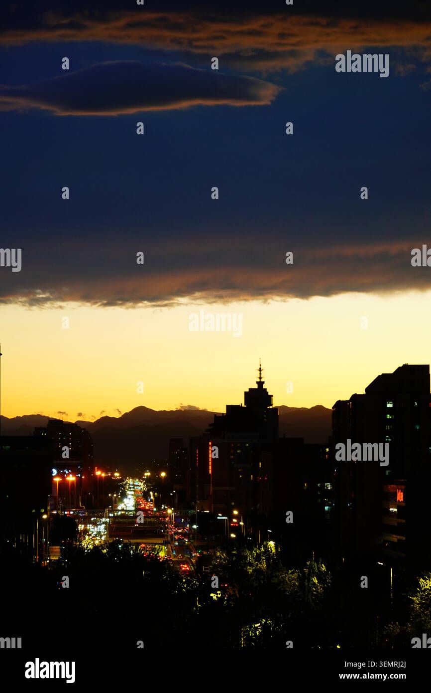 A thick cloud layer splits open in northwest Beijing, creating a ...