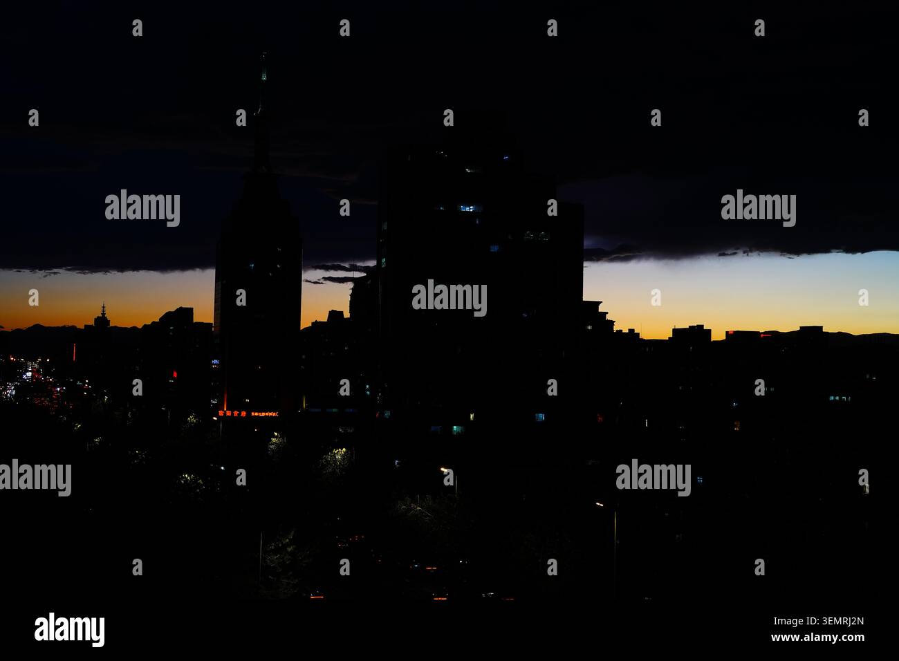 A thick cloud layer splits open in northwest Beijing, creating a ...