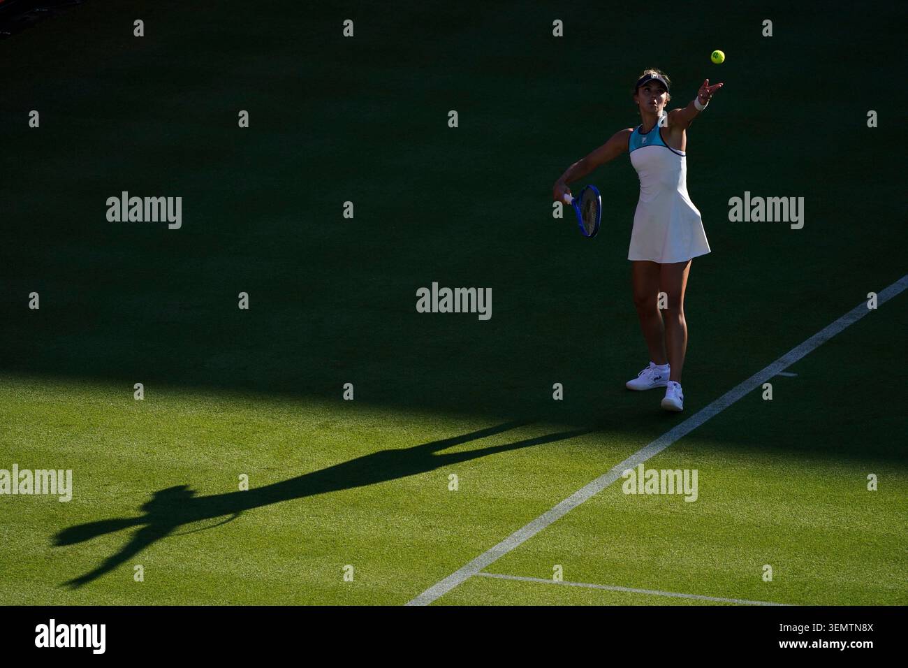 Romania's Jaqueline Cristian serves against China's Qinwen Zheng during ...