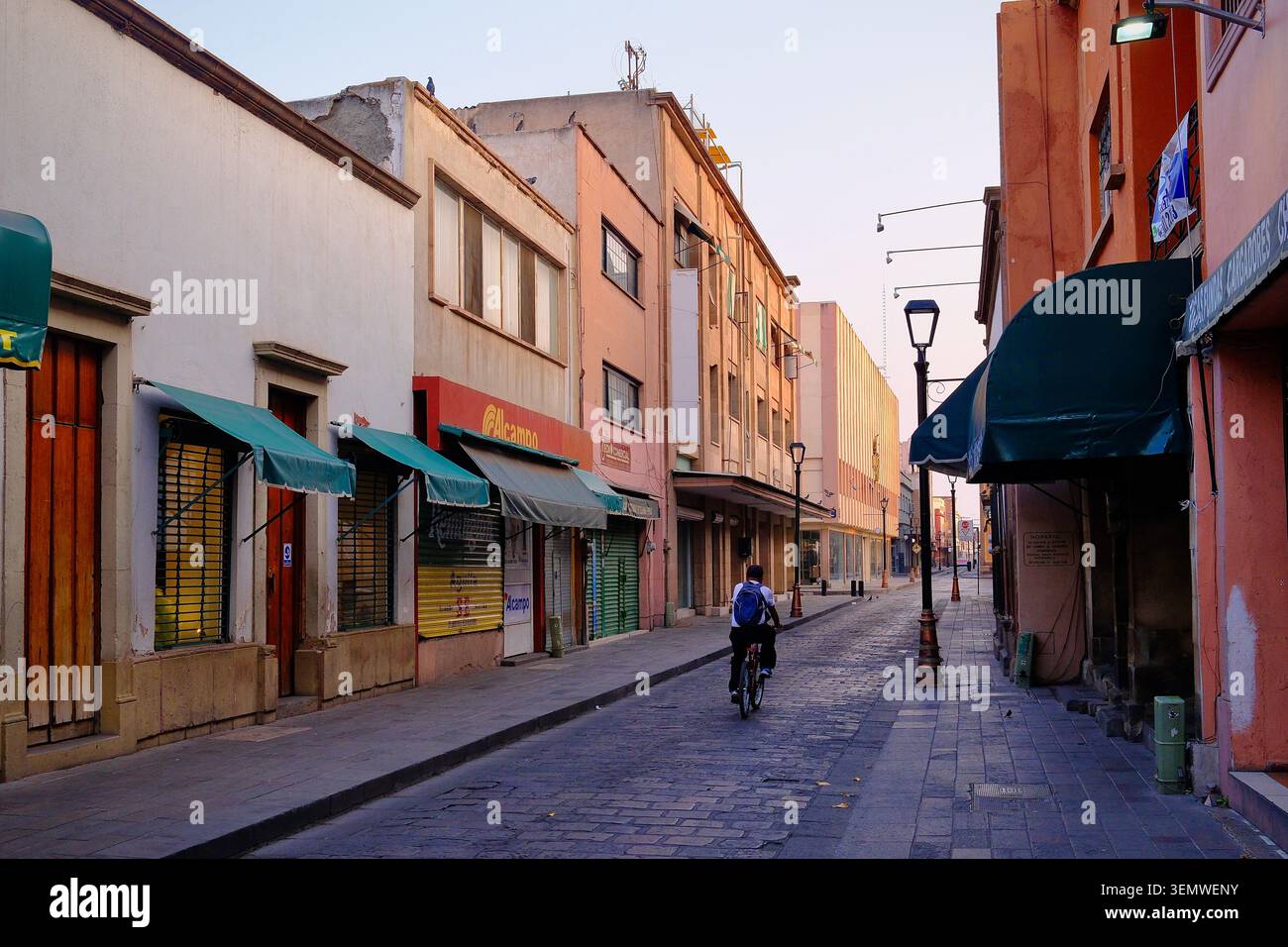 Cyclist Riding Through Empty Historic Street (San Luis Potosi, San Luis ...