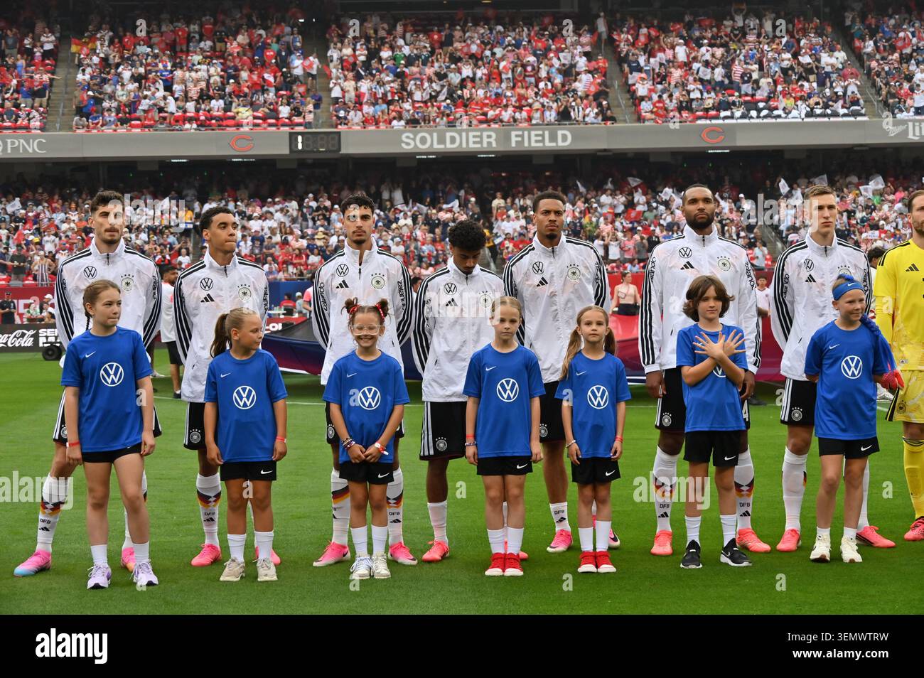 CHICAGO, IL - JUNE 06: Germany stands with young fans prior to a ...