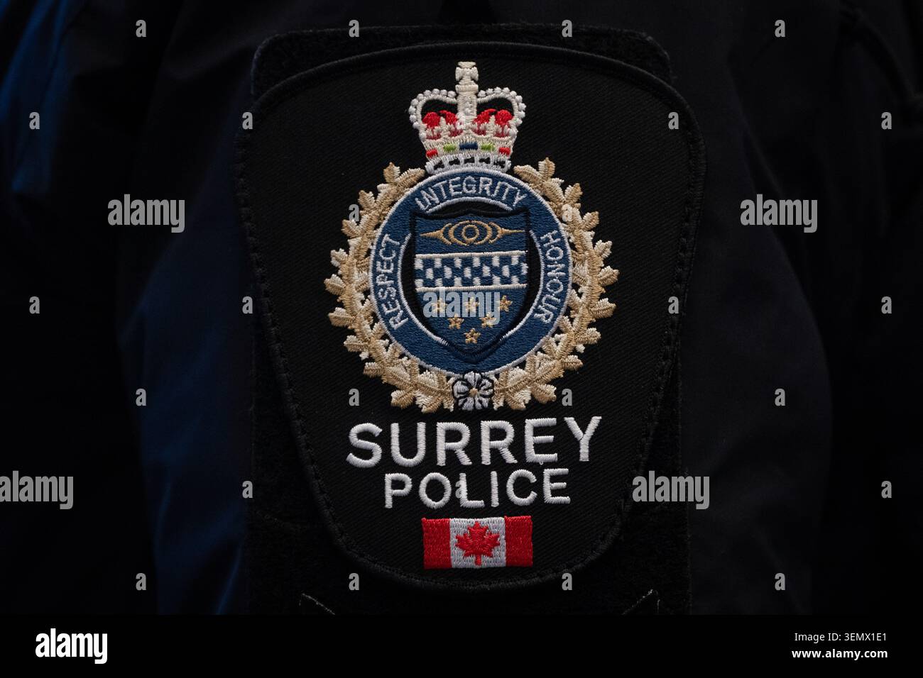 A Surrey Police patch is worn by an officer at RCMP "E" Division ...