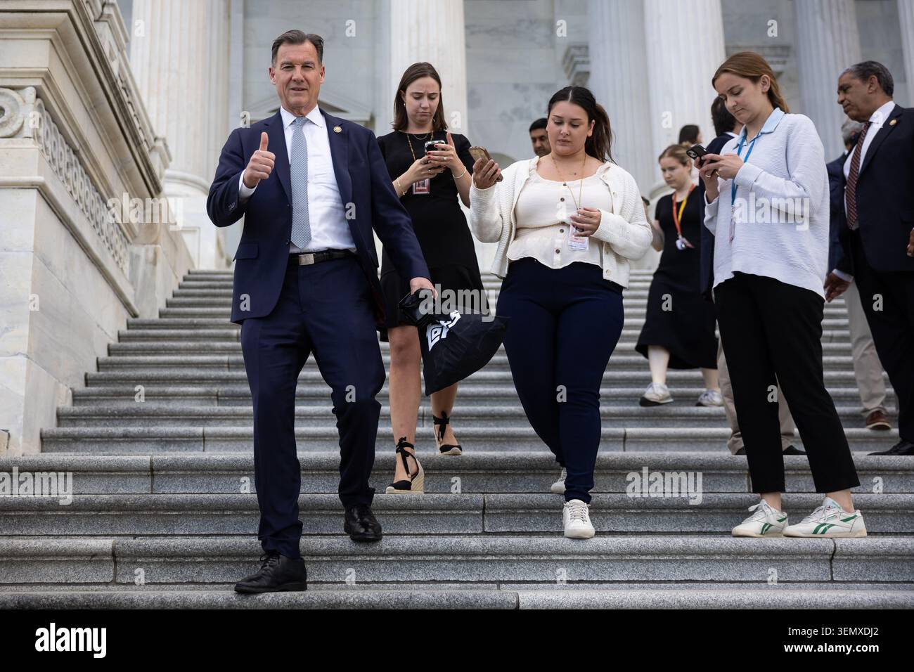 Rep. Tom Suozzi (D-N.Y.) gives a thumbs-up as he departs a vote at the ...