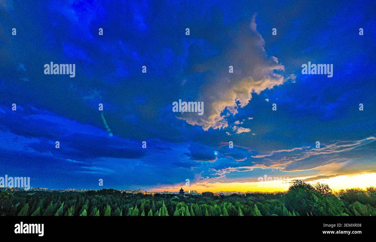 Rainbow and sunset glow paint the sky above the Temple of Heaven in ...