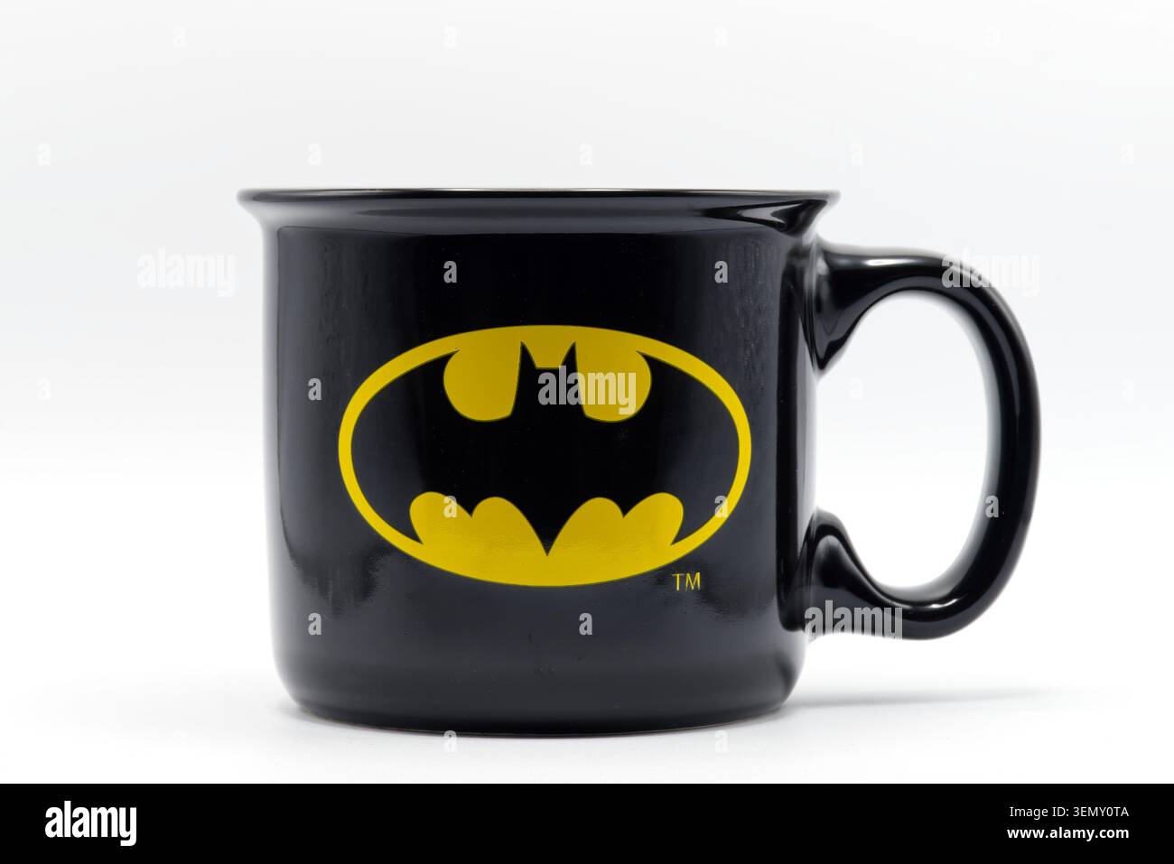 Black ceramic coffee mug with yellow batman superhero logo isolated on ...