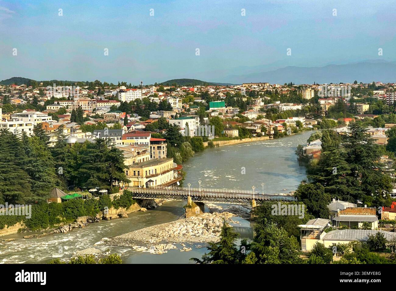 Panoramic view of Kutaisi with the Rioni River and the White bridge ...