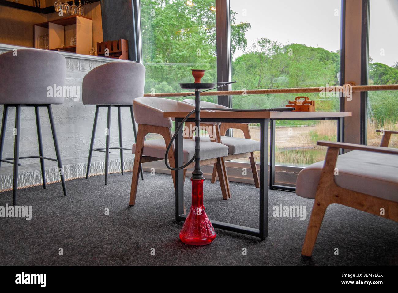Red and black hookah in the restaurant Stock Photo - Alamy