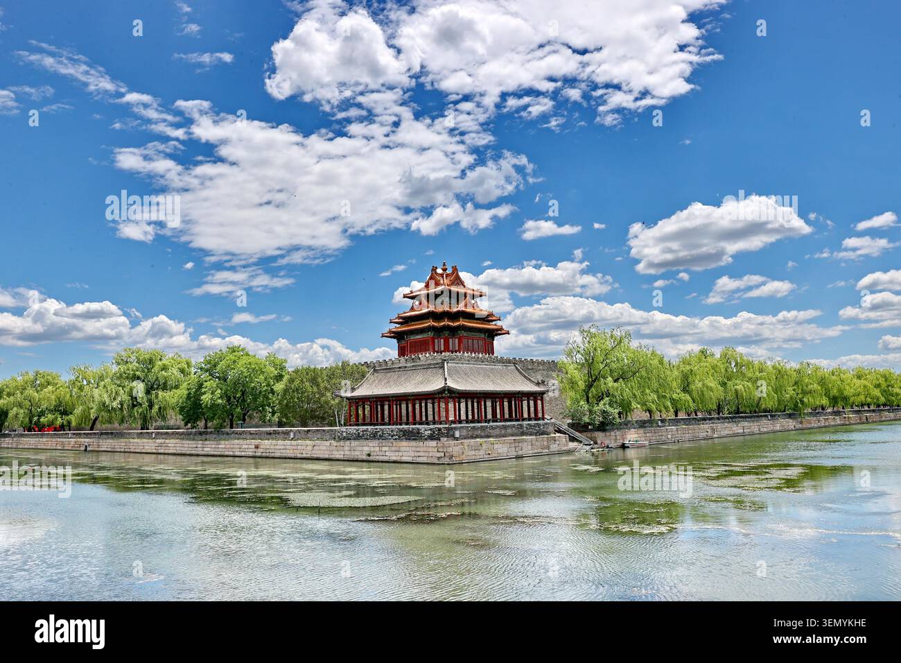 Tourists take photos of the Forbidden City's corner tower against clear ...