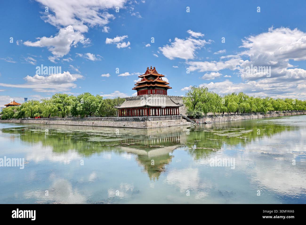 Tourists take photos of the Forbidden City's corner tower against clear ...