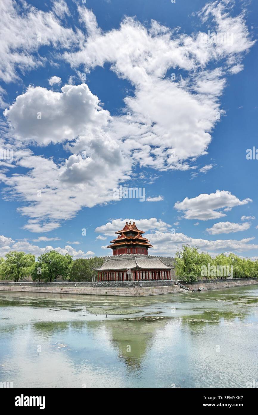 Tourists take photos of the Forbidden City's corner tower against clear ...