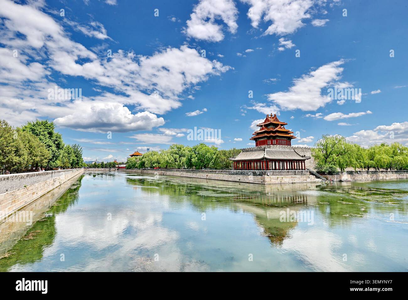 Tourists take photos of the Forbidden City's corner tower against clear ...
