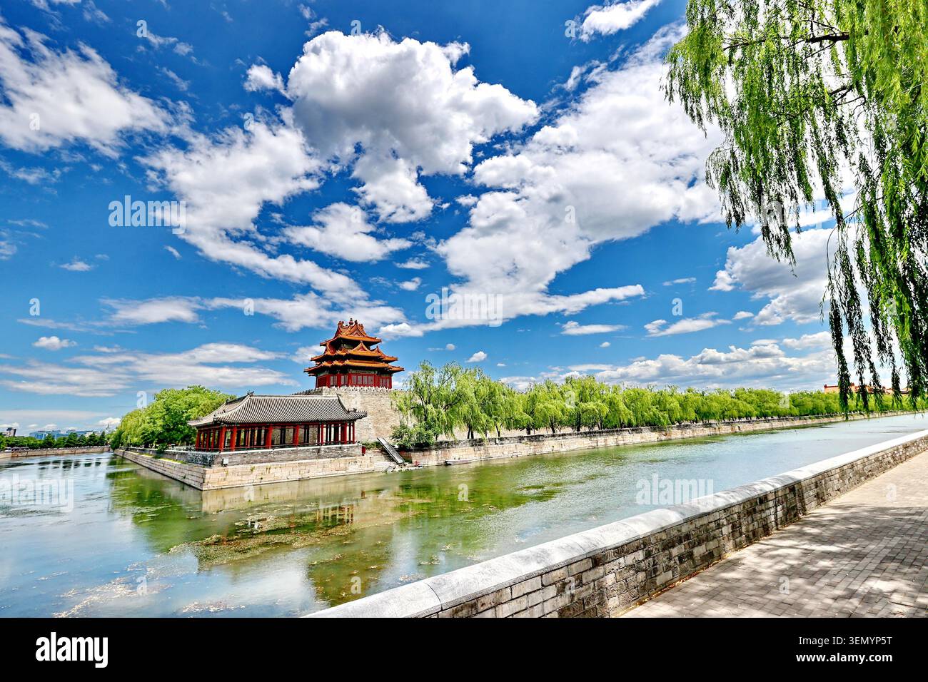 Tourists take photos of the Forbidden City's corner tower against clear ...