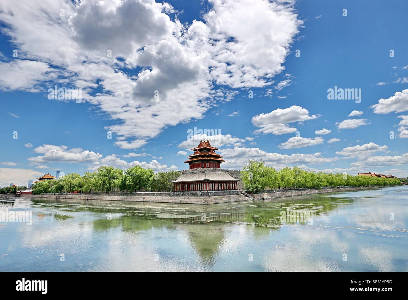 Tourists take photos of the Forbidden City's corner tower against clear ...