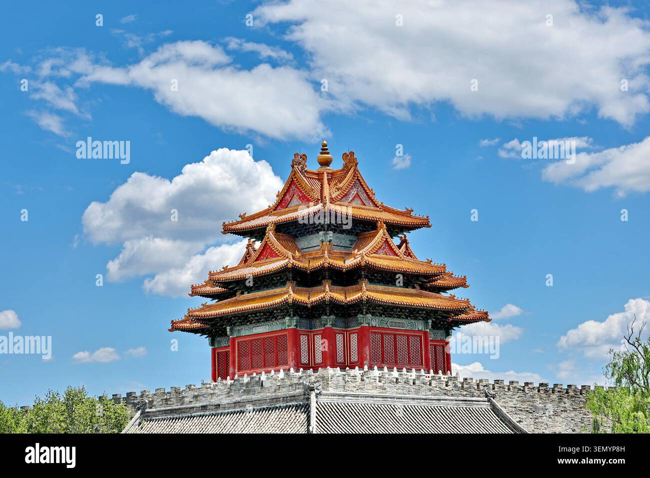 Tourists take photos of the Forbidden City's corner tower against clear ...