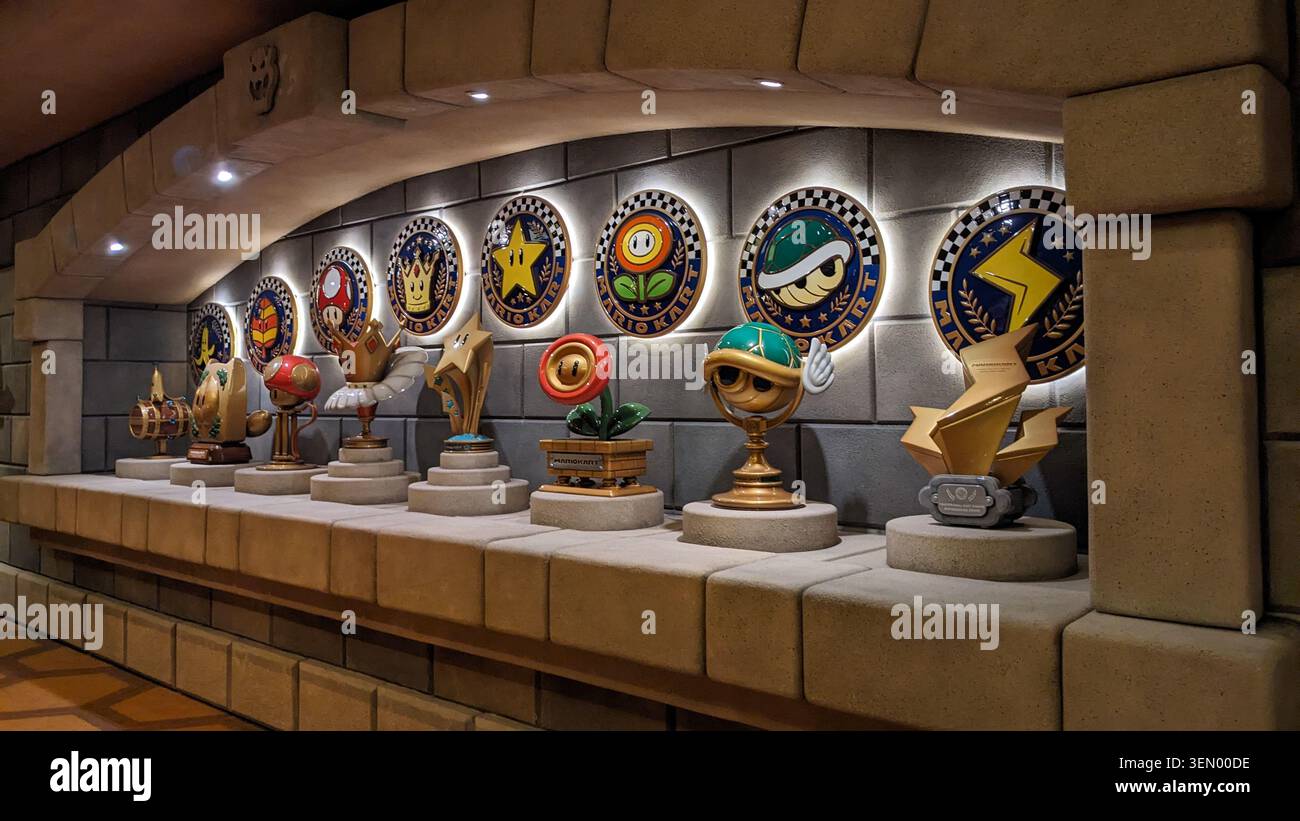 Mario Kart themed trophy display with illuminated character emblems at ...