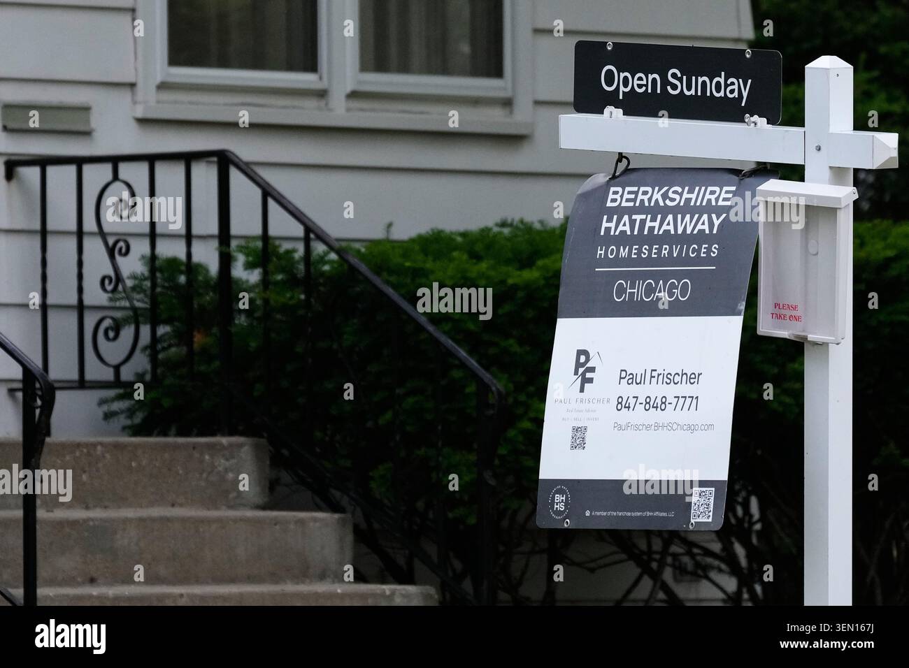 Information sign about open house for home sale is seen outside of a ...