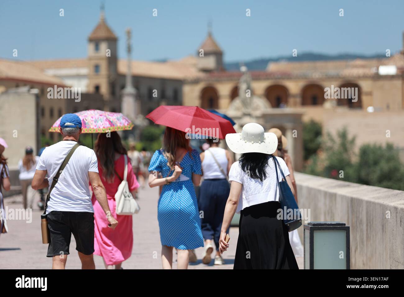 Citizens and visitors to Cordoba combat the rising temperatures that ...